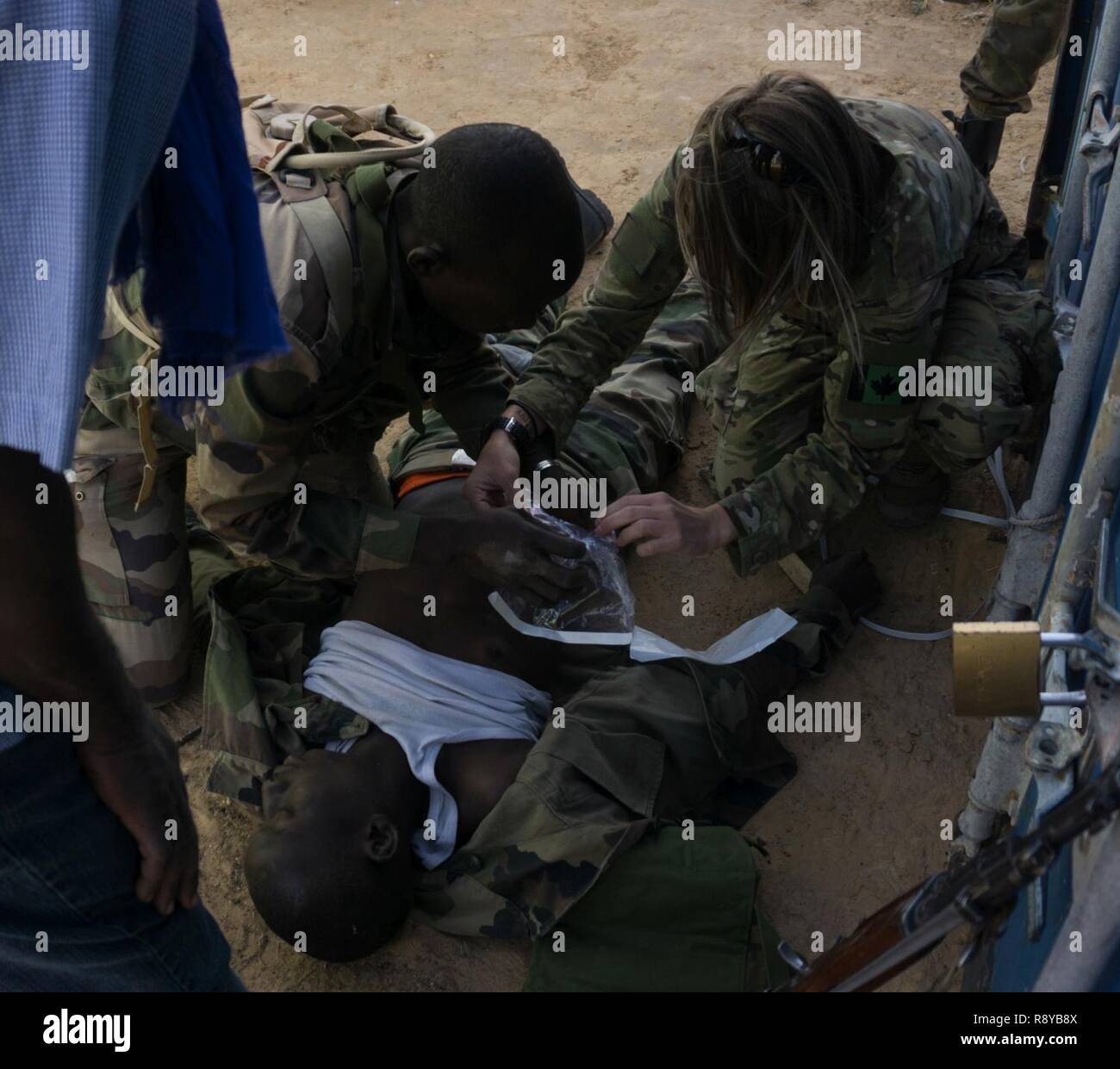 A Canadian Special Operations Forces Command medic provides instruction ...