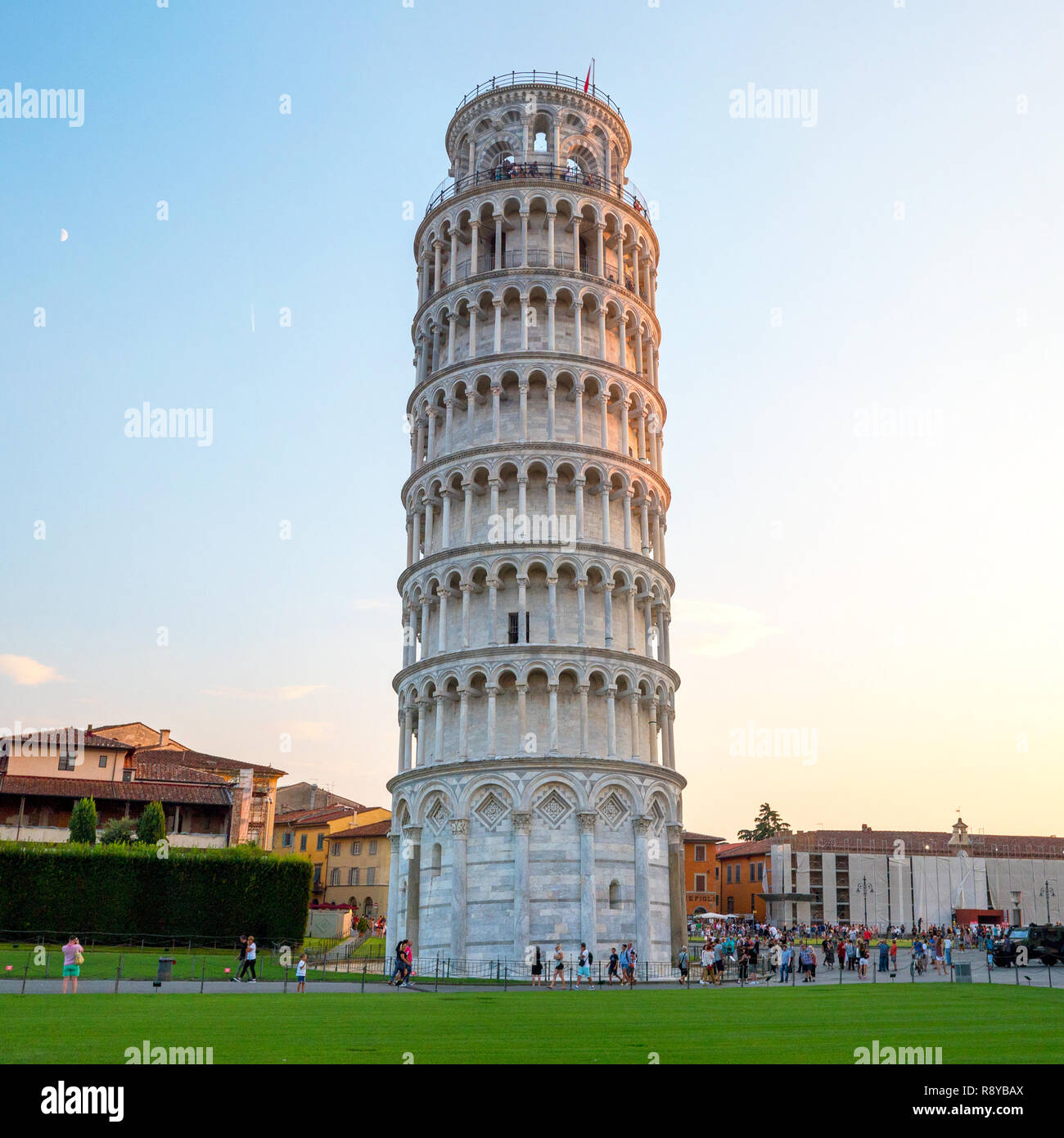 Tourist visiting the leaning tower of Pisa, known worldwide for its ...