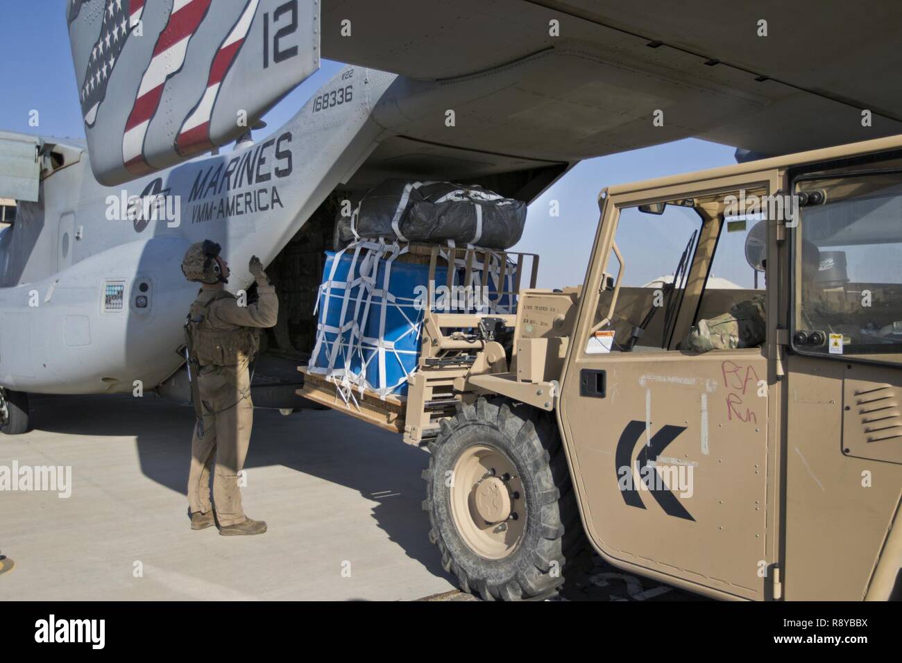 U.S. Army riggers and Marine MV-22 Osprey flight crew, with Marine ...