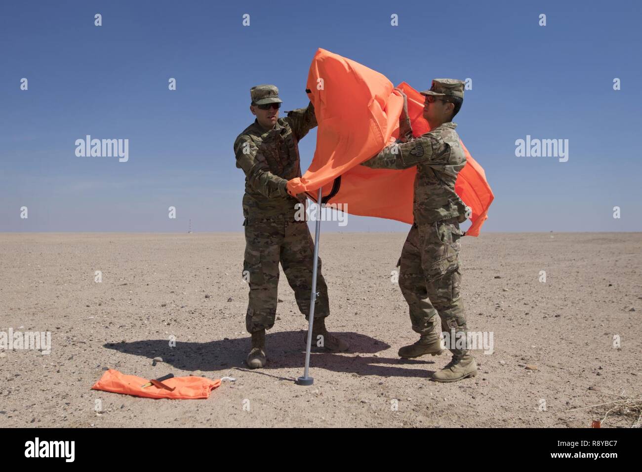 Soldiers, with the 1st Sustainment Command (Theater), set up a VS17 ...