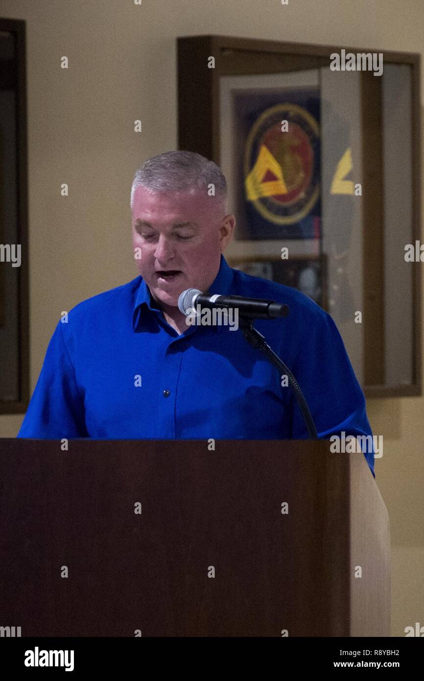 U.S. Navy Lieutenant Commander Garry Thornton says grace during the ...