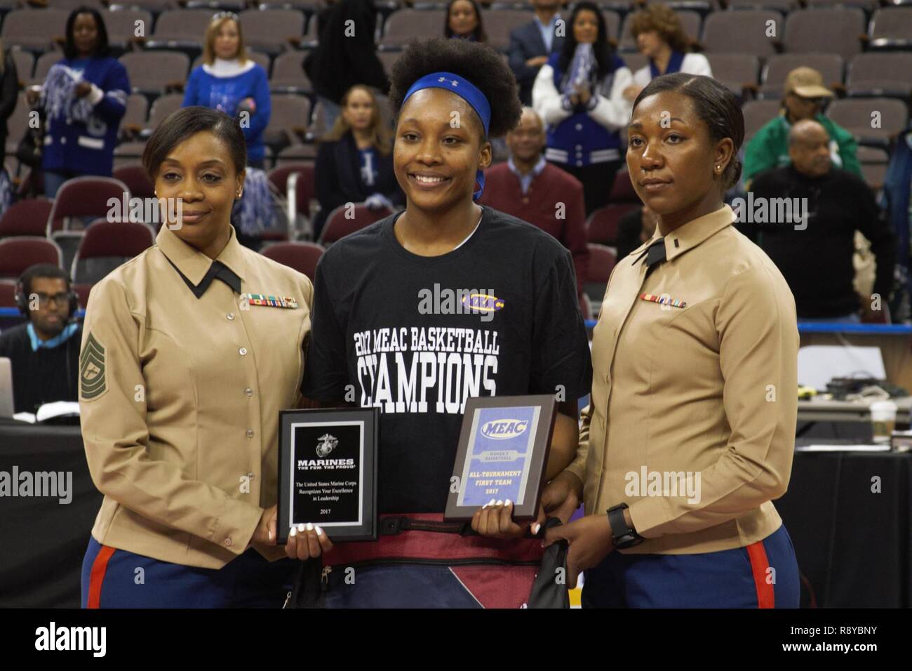 Marines pose for a picture with Monnazjea Finney-Smith of Hampton at ...