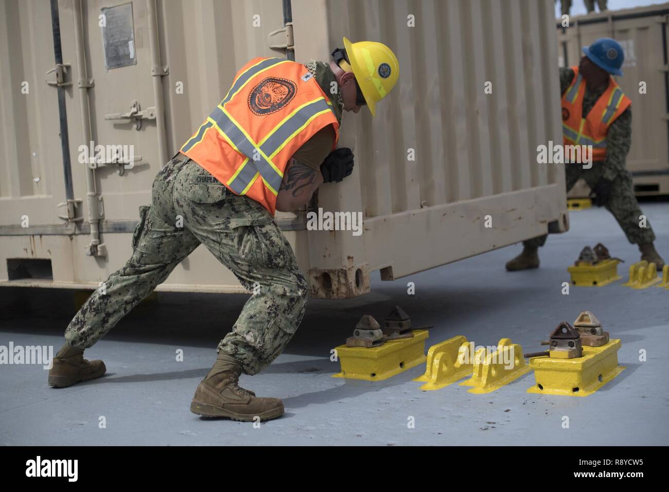 Boatswain’s Mate 2nd Class Anthony Chaplin, assigned to Navy Cargo ...