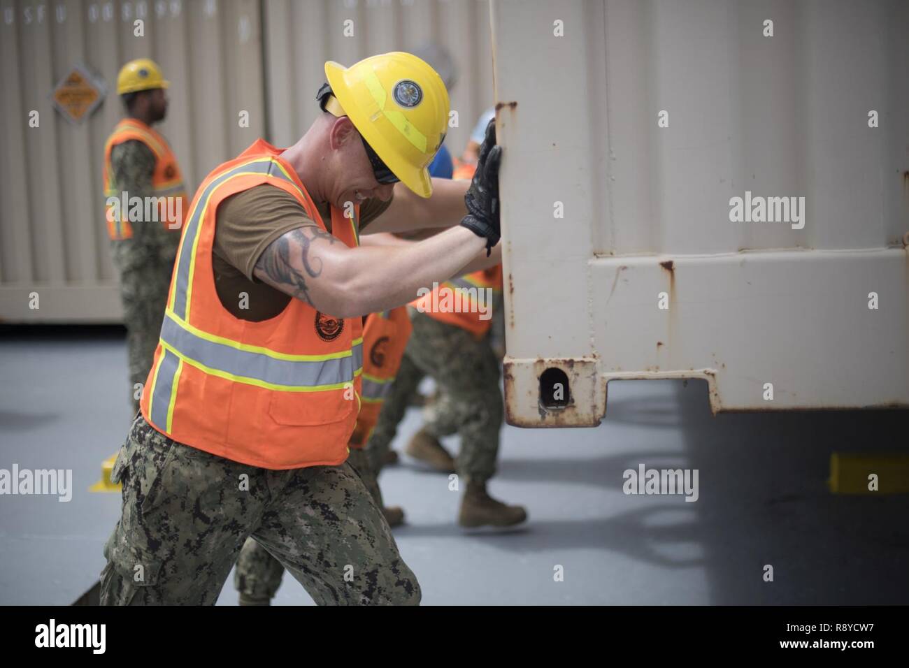 Boatswain’s Mate 2nd Class Anthony Chaplin, assigned to Navy Cargo ...