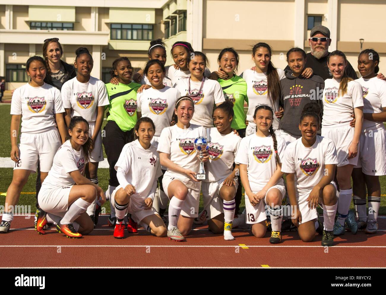The Matthew C. Perry Lady Samurai soccer team poses for a photo during ...