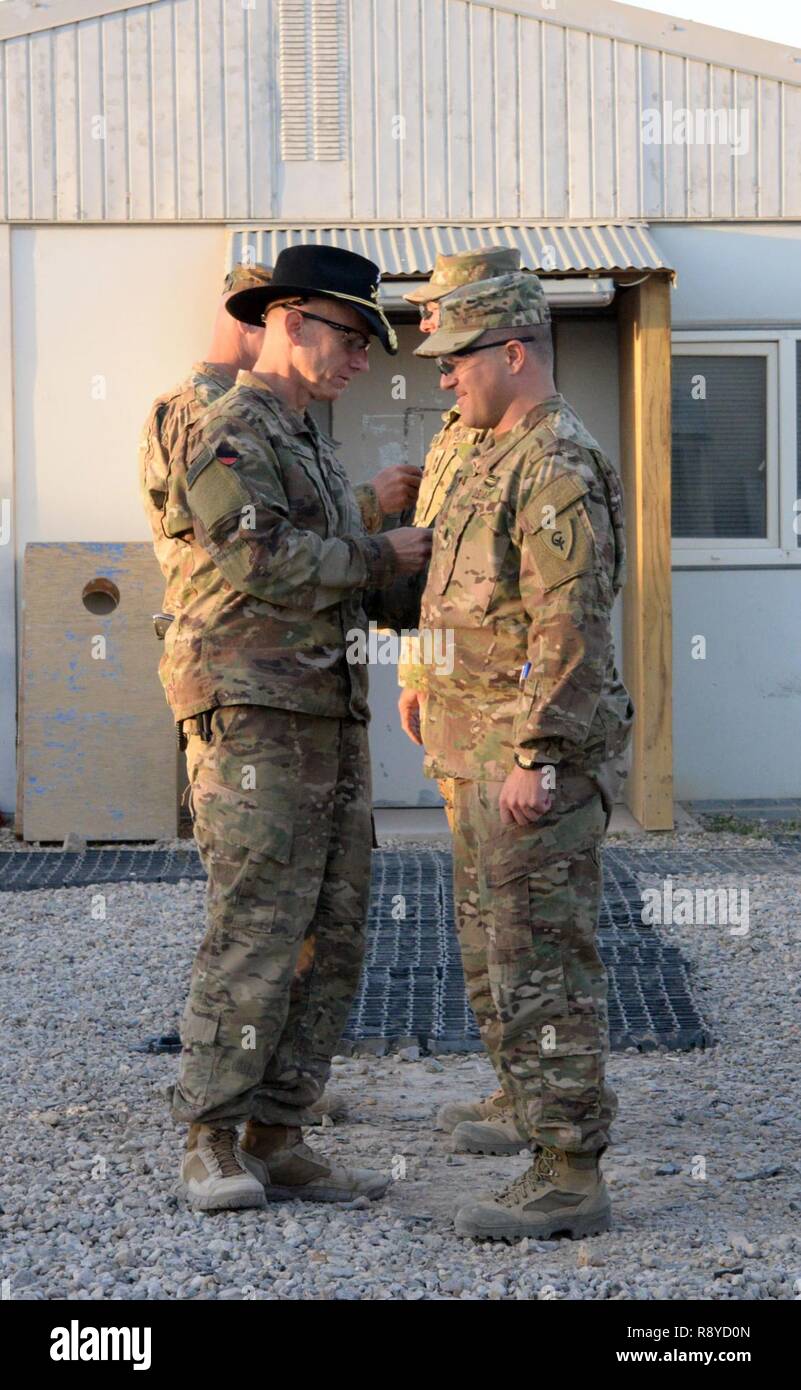 Brig. Gen. D. A. Sims, Task Force Forge commander, gives Lt. Col ...