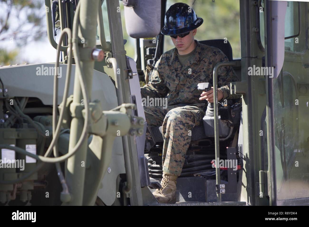 U.S. Marine Corps Lance Cpl. Josiah J. Norton, a heavy equipment ...
