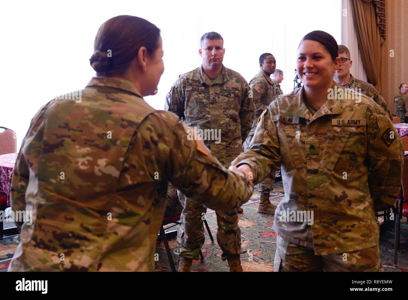 U.S. Army Command Sgt. Maj. Sheryl Lyon (left), the U.S. Army Europe ...