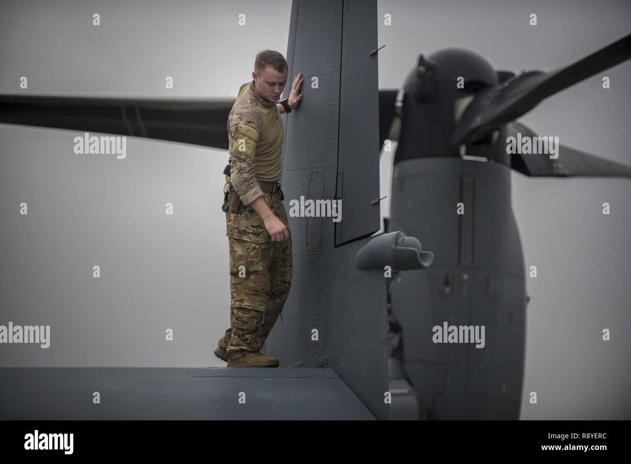 A flight engineer with the 8th Special Operations Squadron runs pre ...