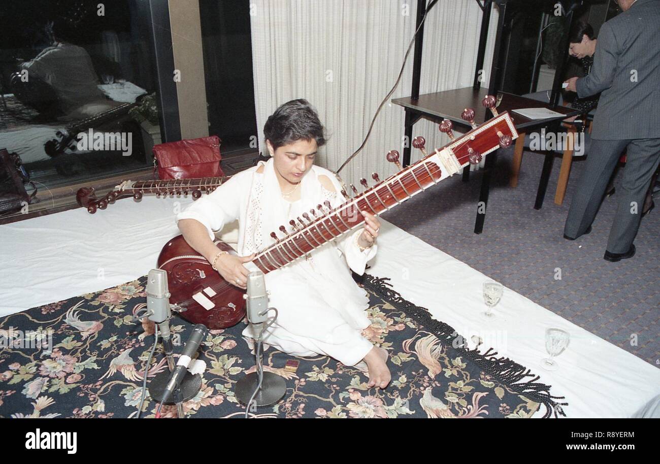 Woman playing a mandolin hi-res stock photography and images - Alamy