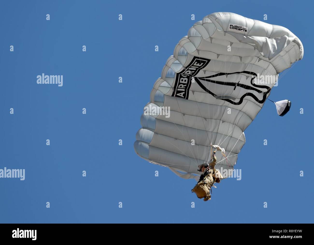 A member of the U.S. Army Black Dagger parachute demonstation team ...