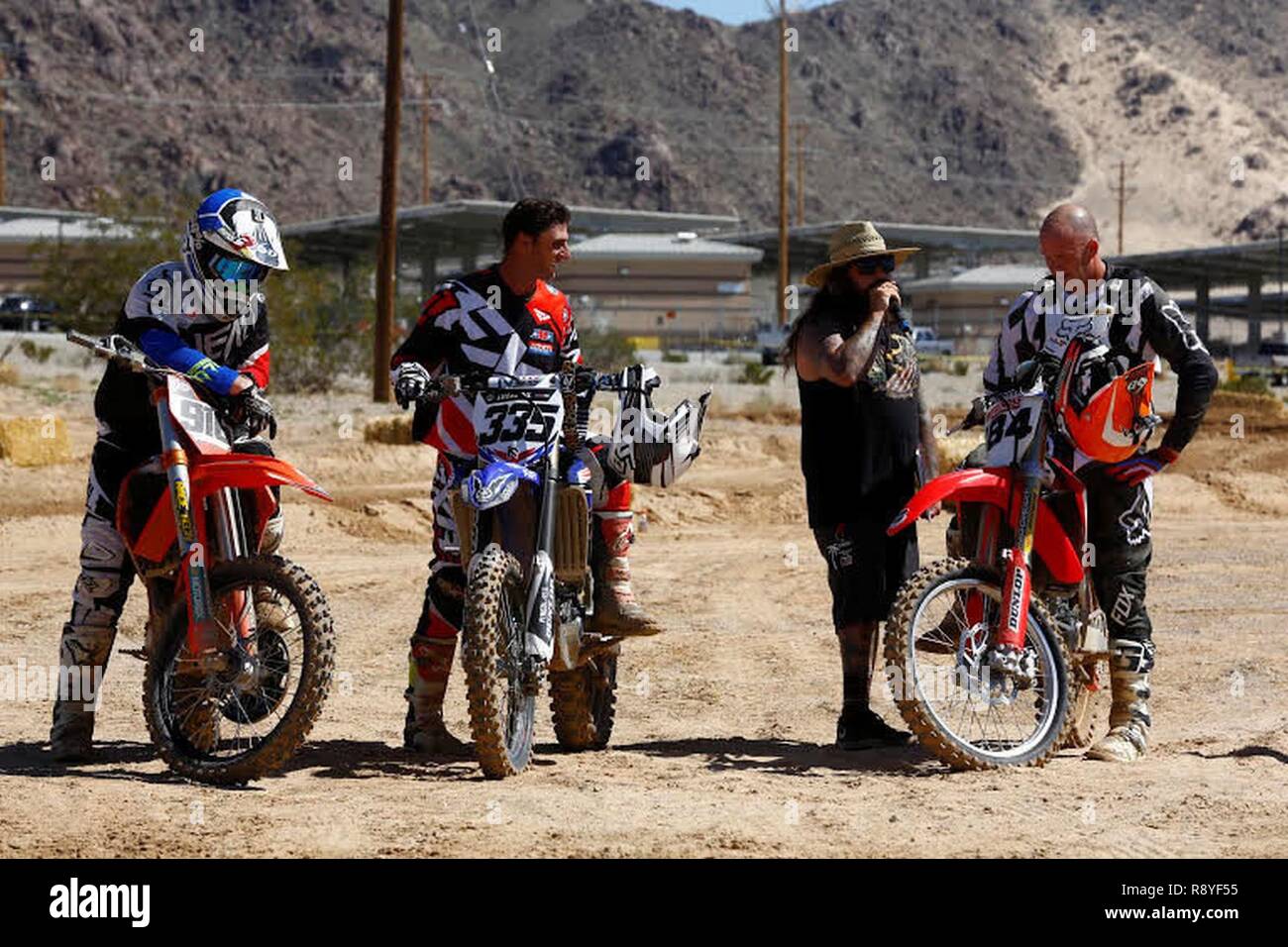 The Master of Ceremonies congratulates John Jelderda, Dennis Stapleton ...