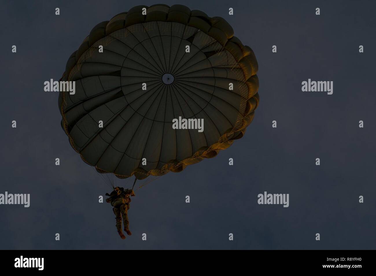 A Soldier from the 3rd Special Forces Group, Ft. Bragg, N.C.,descends ...