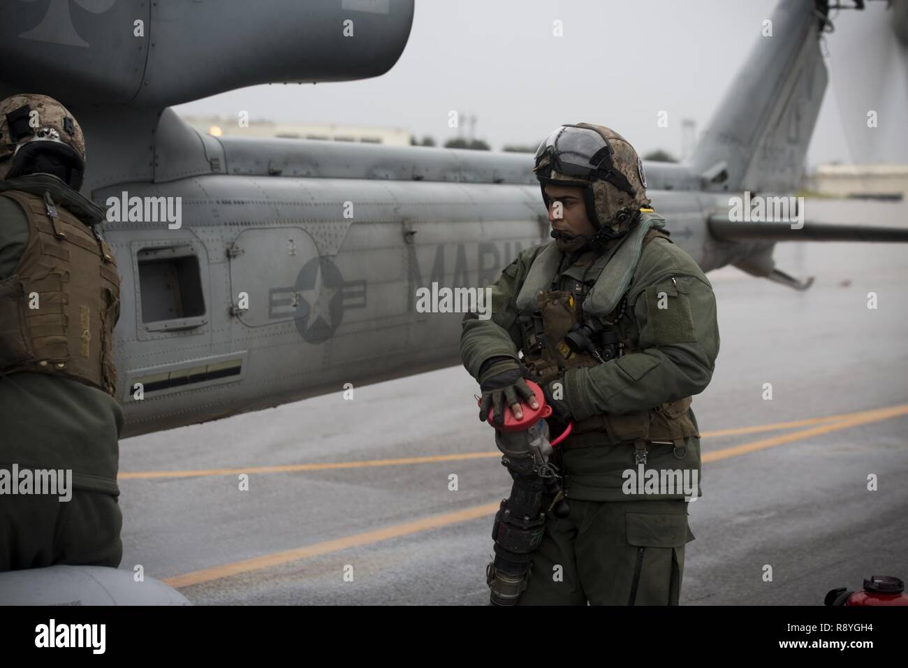 Sgt. Kevin Carpio, a UH-1Y crew chief with Marine Light Attack ...