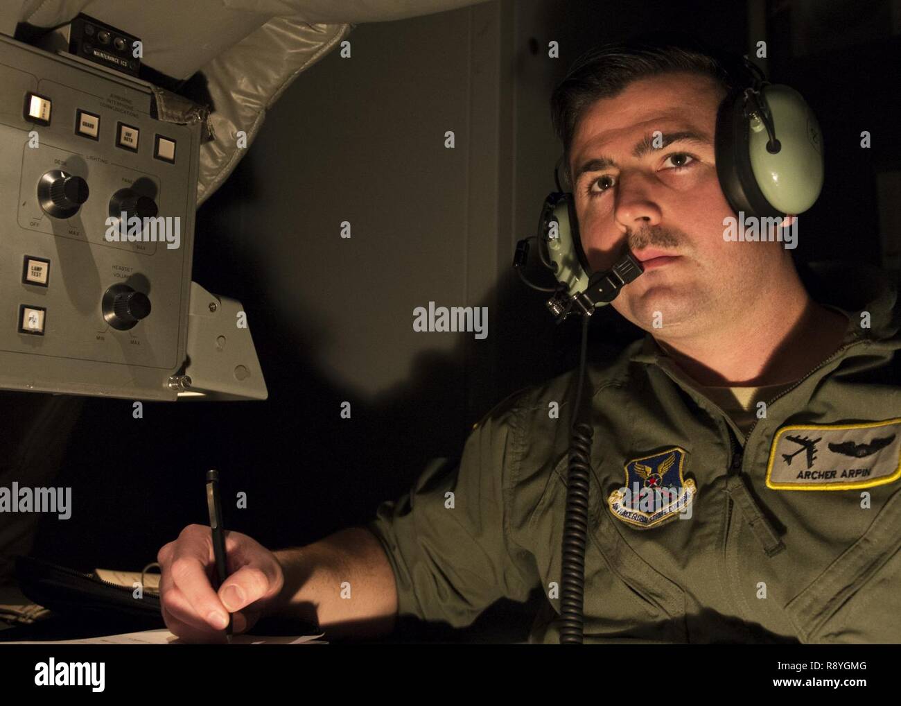 Capt. Kevin Arpin, 69th Bomb Squadron instructor pilot, inspects the ...