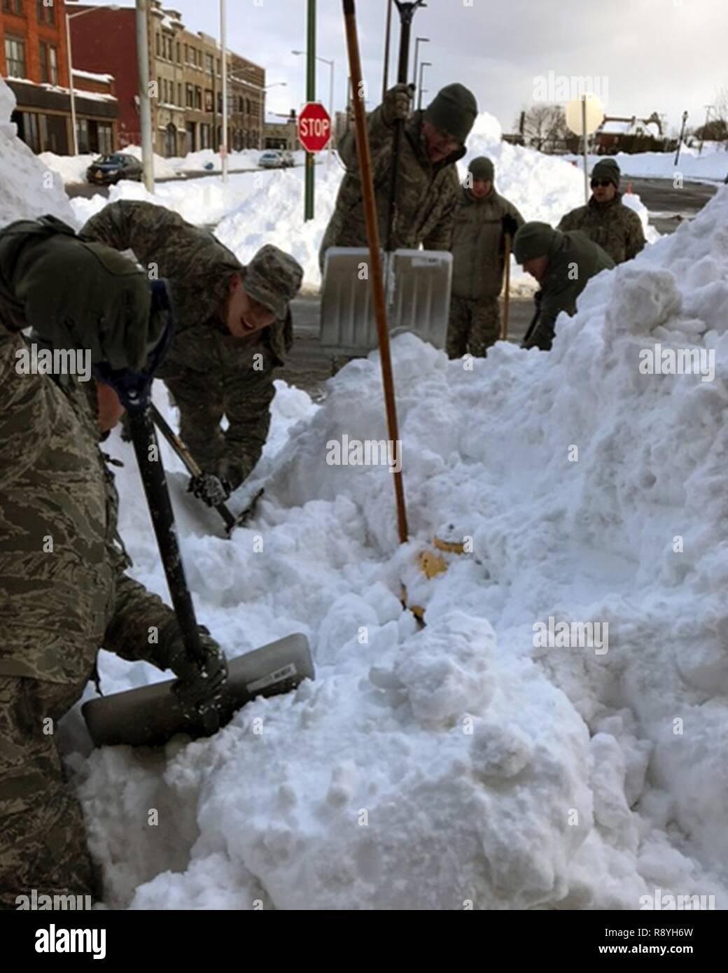 U.S. Soldiers and Airmen with the New York National Guard clear snow in ...