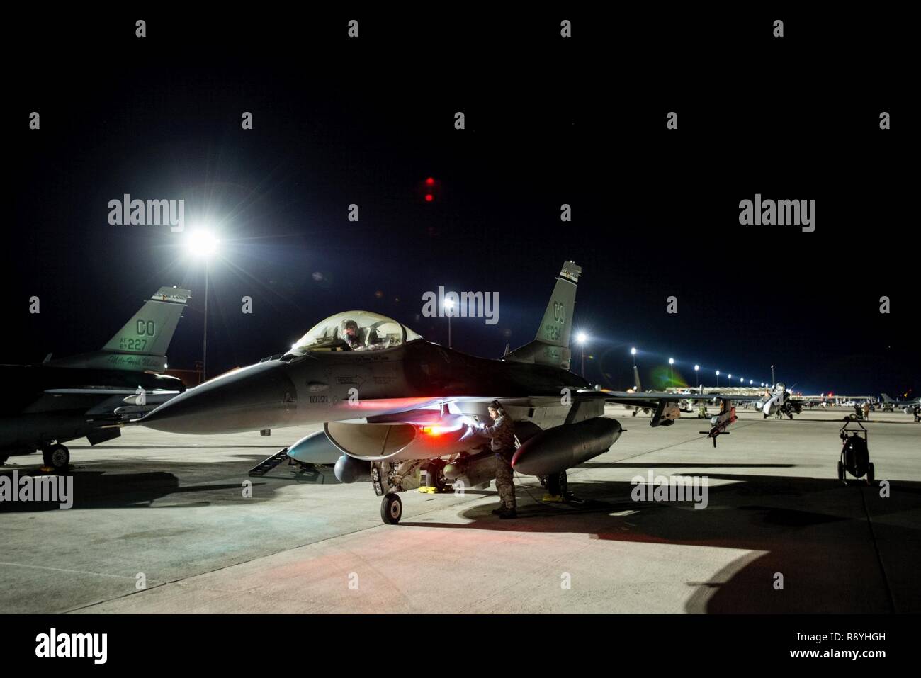 An F-16 Fighting Falcon pilot and his crew chief from the 120th Fighter ...