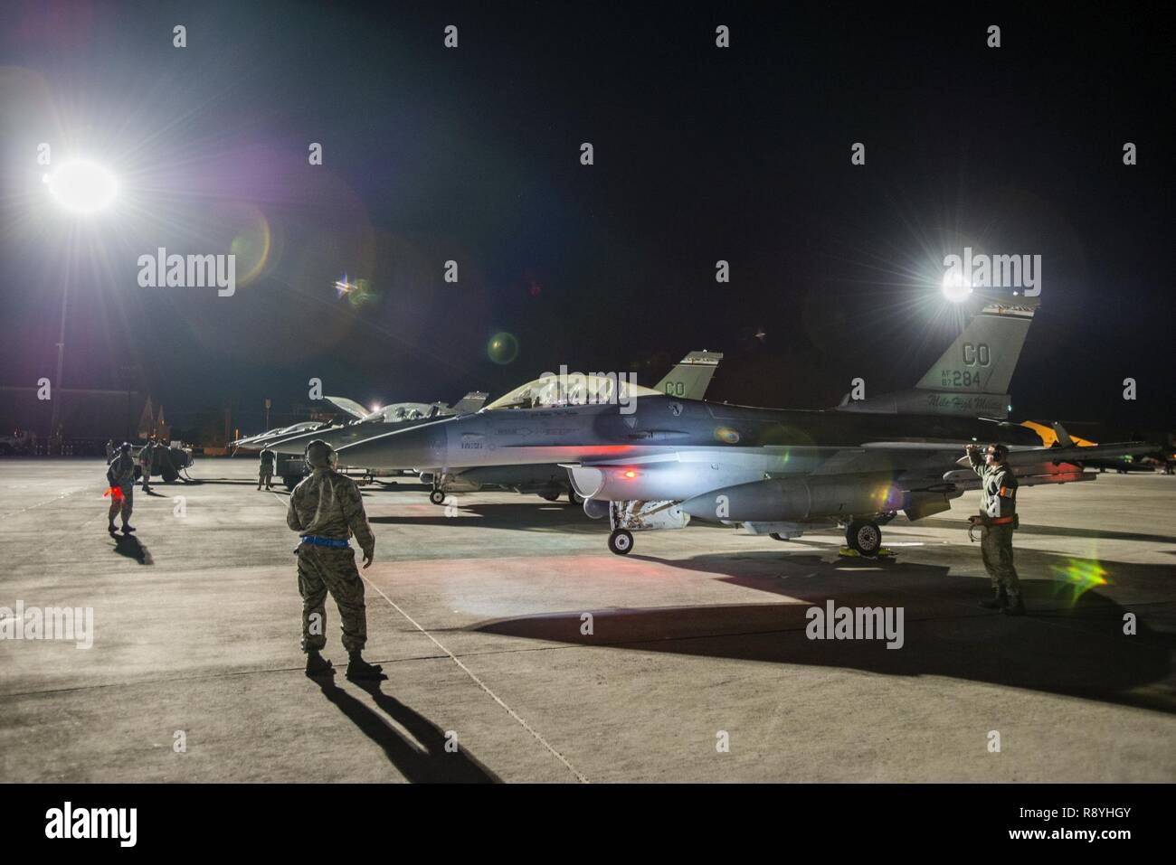 Tech. Sgt. James Grevious, a crew chief (left) and Senior Airman Ryan ...