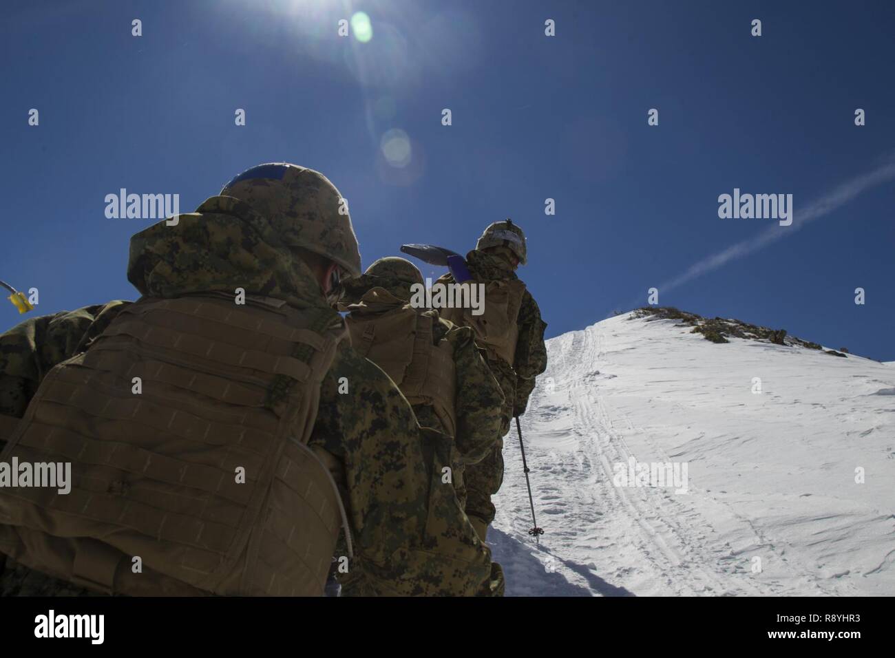 Marines with 1st Combat Engineer Battalion climb a 10,000 ft. peak ...