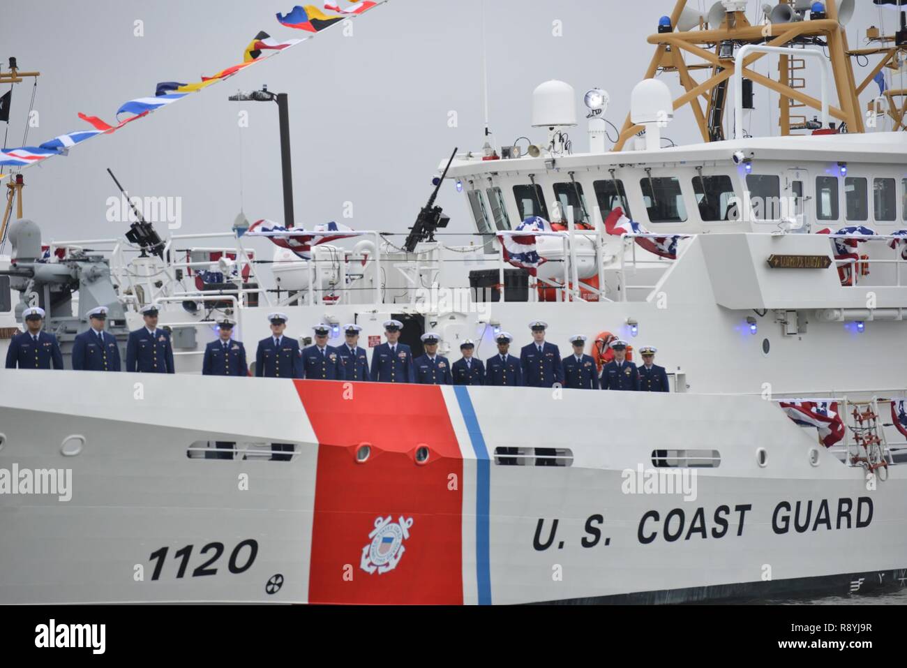 The crew of Coast Guard Cutter Lawrence Lawson gathers on the newly ...
