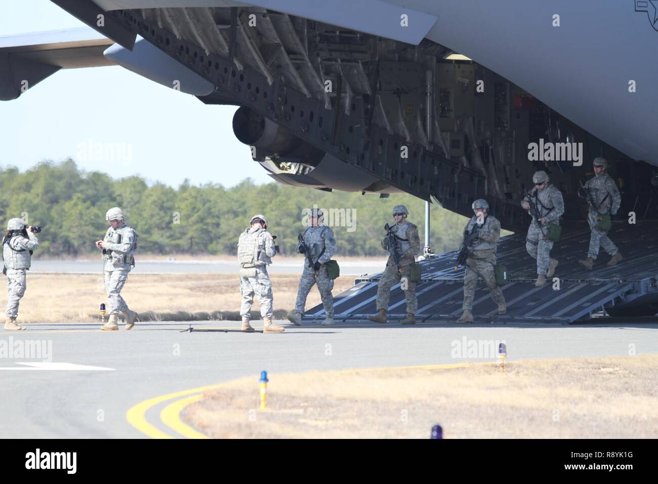 Army Reserve Soldiers from the 340th Military Police Company step off a ...