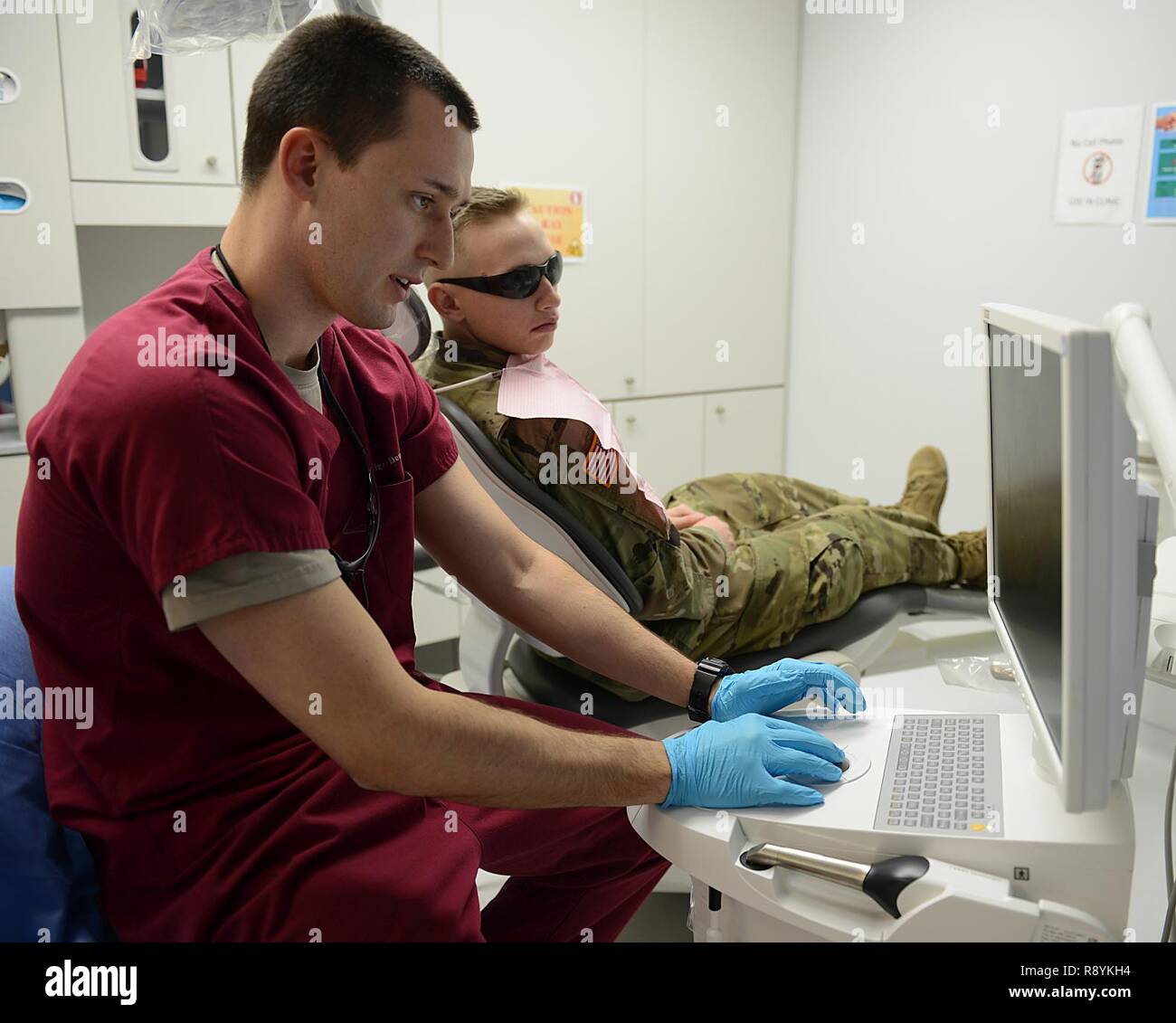 U.S. Army Capt. Tyler Oatmen, U.S. Army Dental Command dentist ...