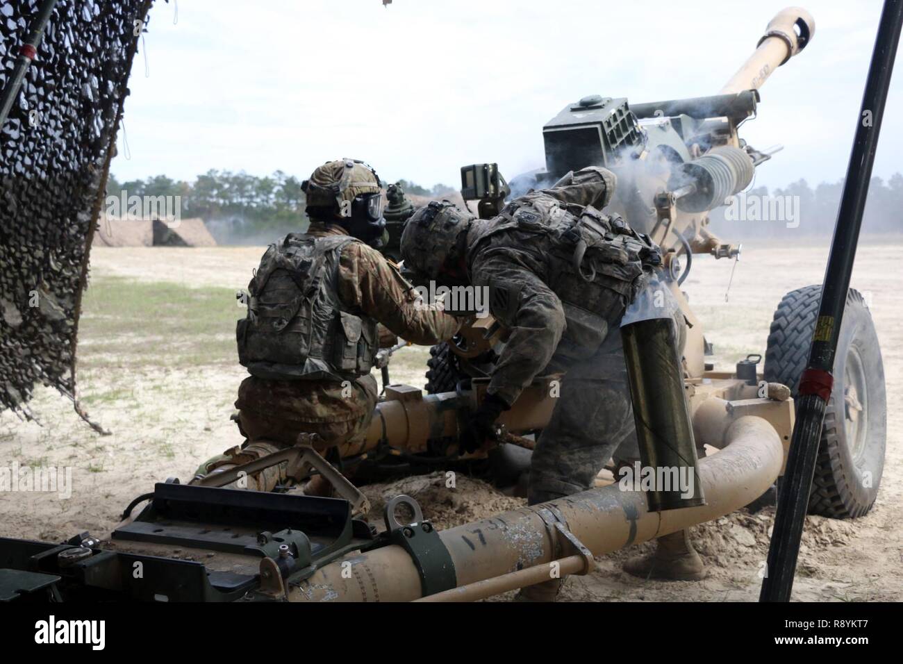 Artillerymen with Alpha Battery, 1st Battalion, 9th Field Artillery ...