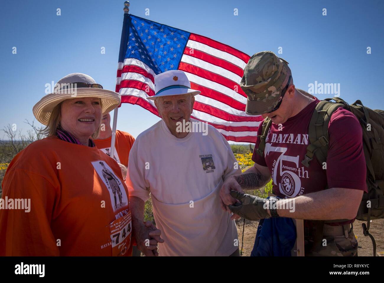 U.S. Army Spc. Michael Cole, a medic from Austin, Texas, checks the ...