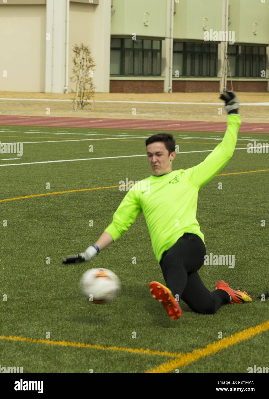 The goalie from Canadian Academy High School blocks a Yokota High ...