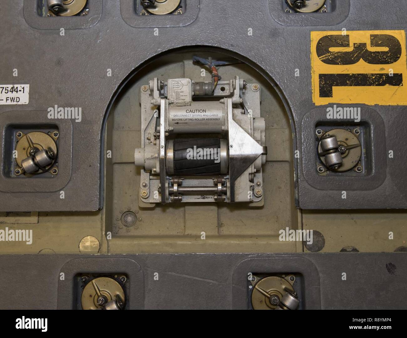 One of several motorized roller assemblies embed in the floor of the ...