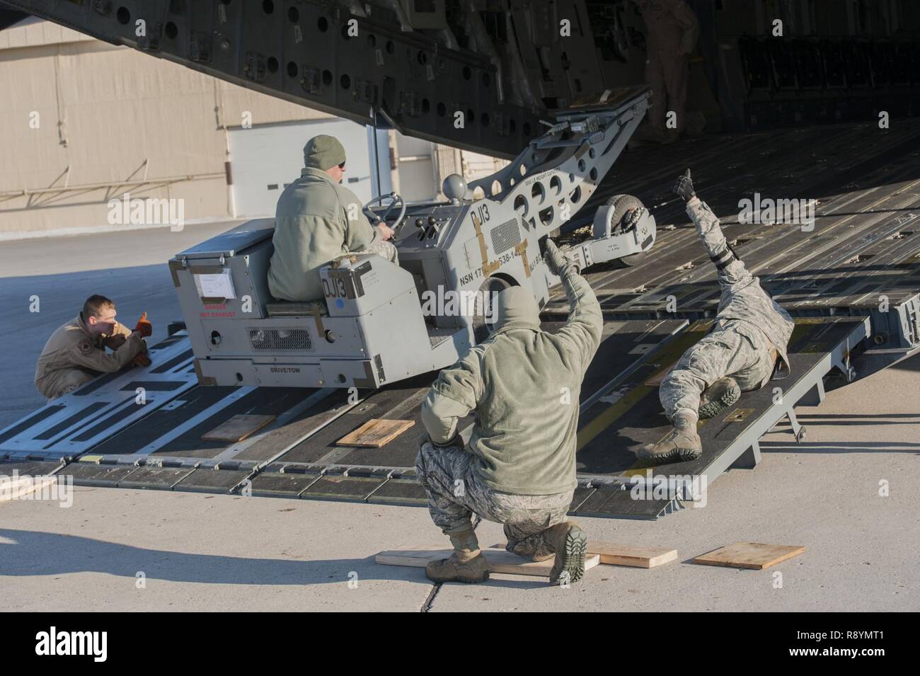 (From left) Staff Sgt. Conor Gillespie, 21st Airlift Squadron ...