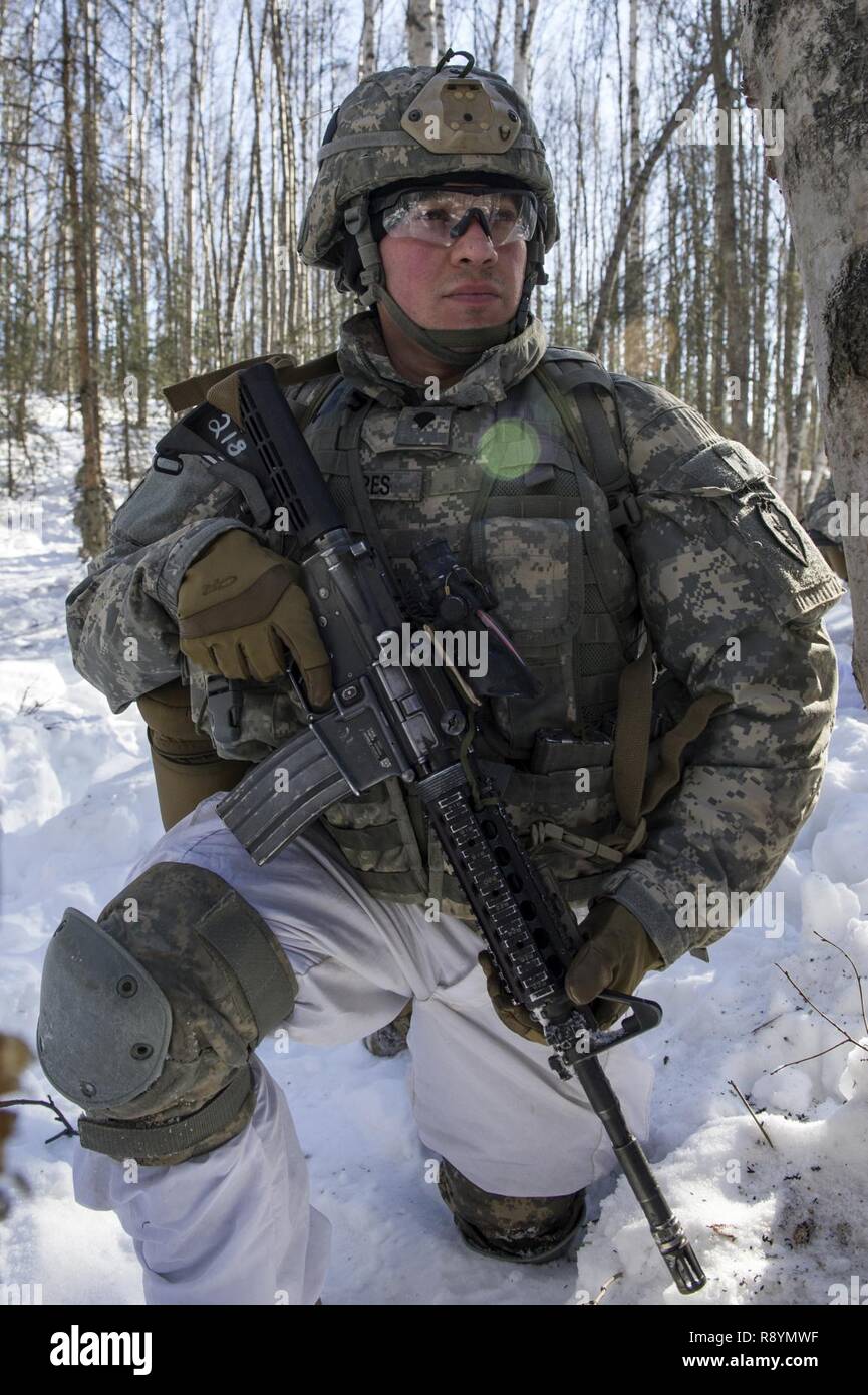 Spc. Enrique Flores, a paratrooper assigned to Apache Company, 1st ...