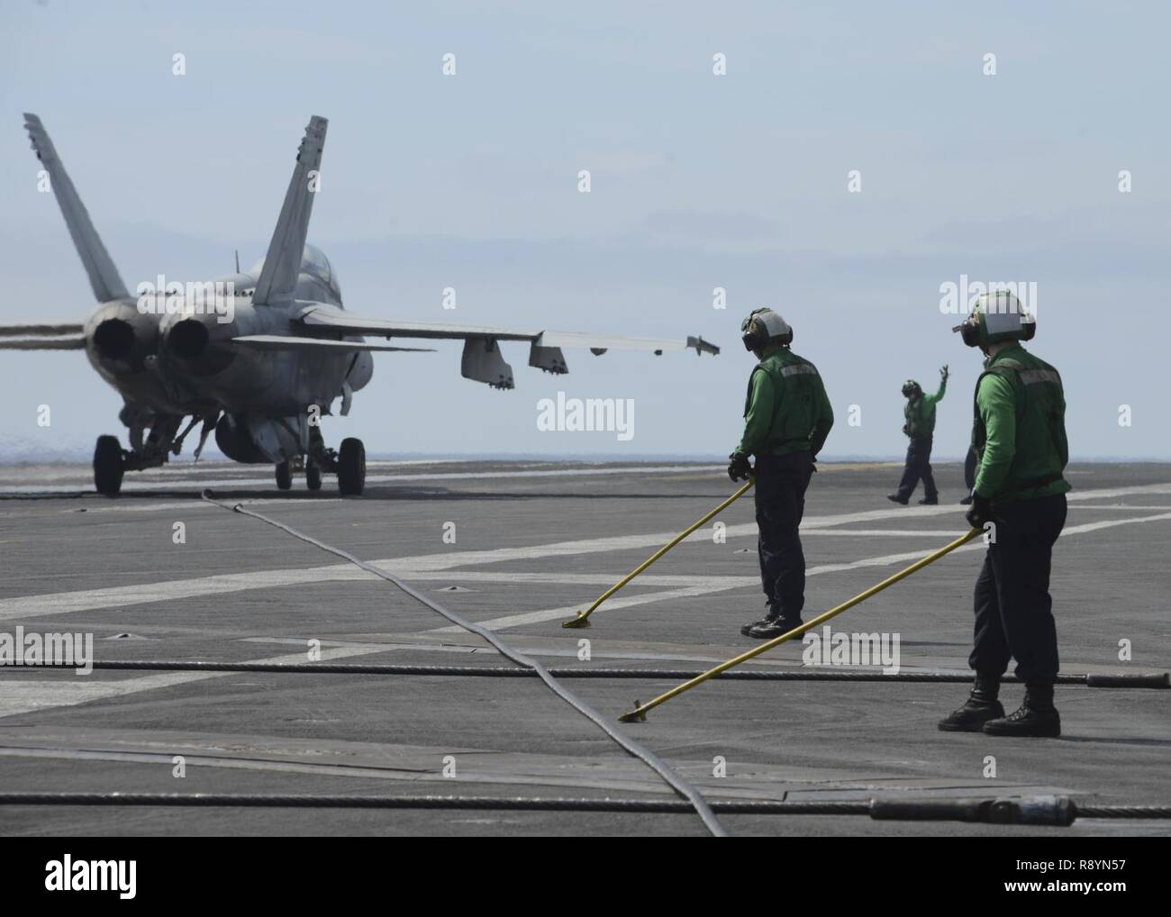PACIFIC OCEAN (March 19, 2017) - Sailors prepare to push back the ...