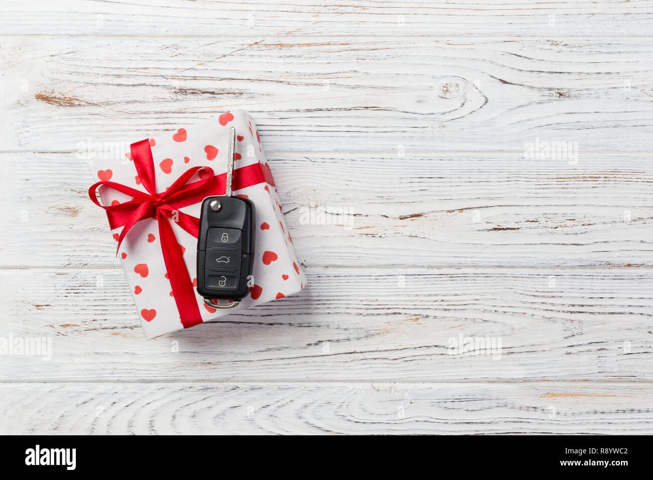 Valentine or other holiday handmade present in paper with red hearts ...