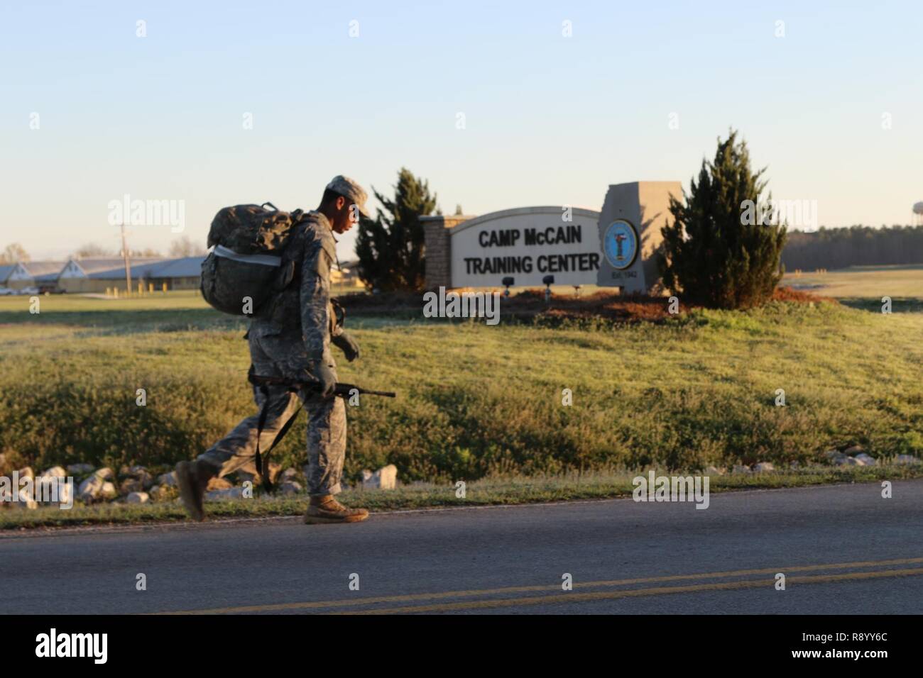 Sgt. Marc Doss moves past the Camp McCain sign during the 12-mile ruch ...
