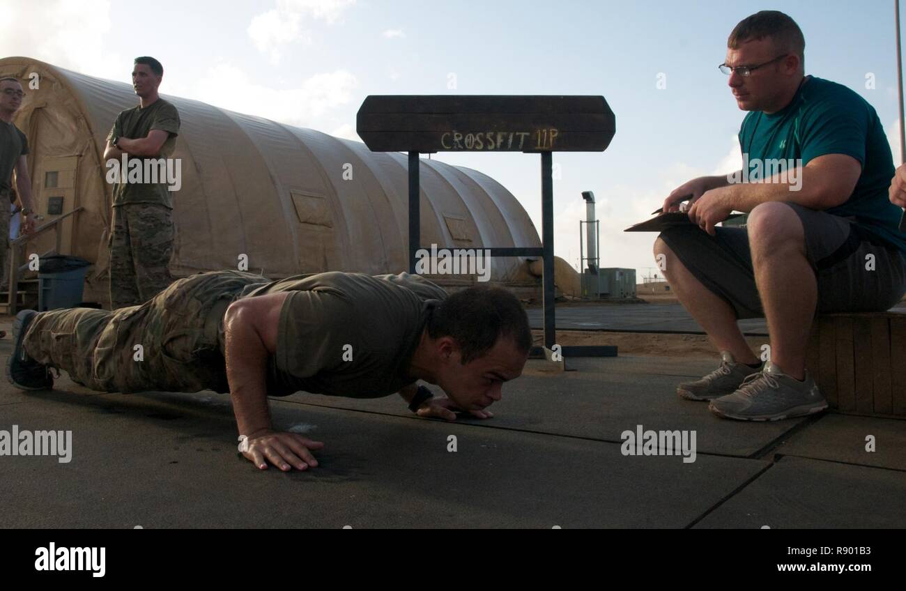 U.S. Army 1st Lt. Benjamin Witherspoon, right, assigned to Headquarters ...