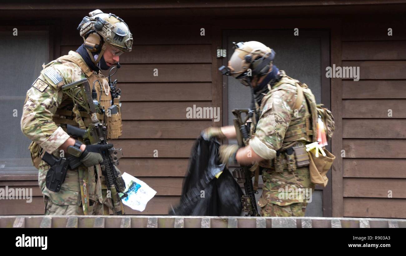 U.S. Special Operations Forces search for evidence during a sensitive ...