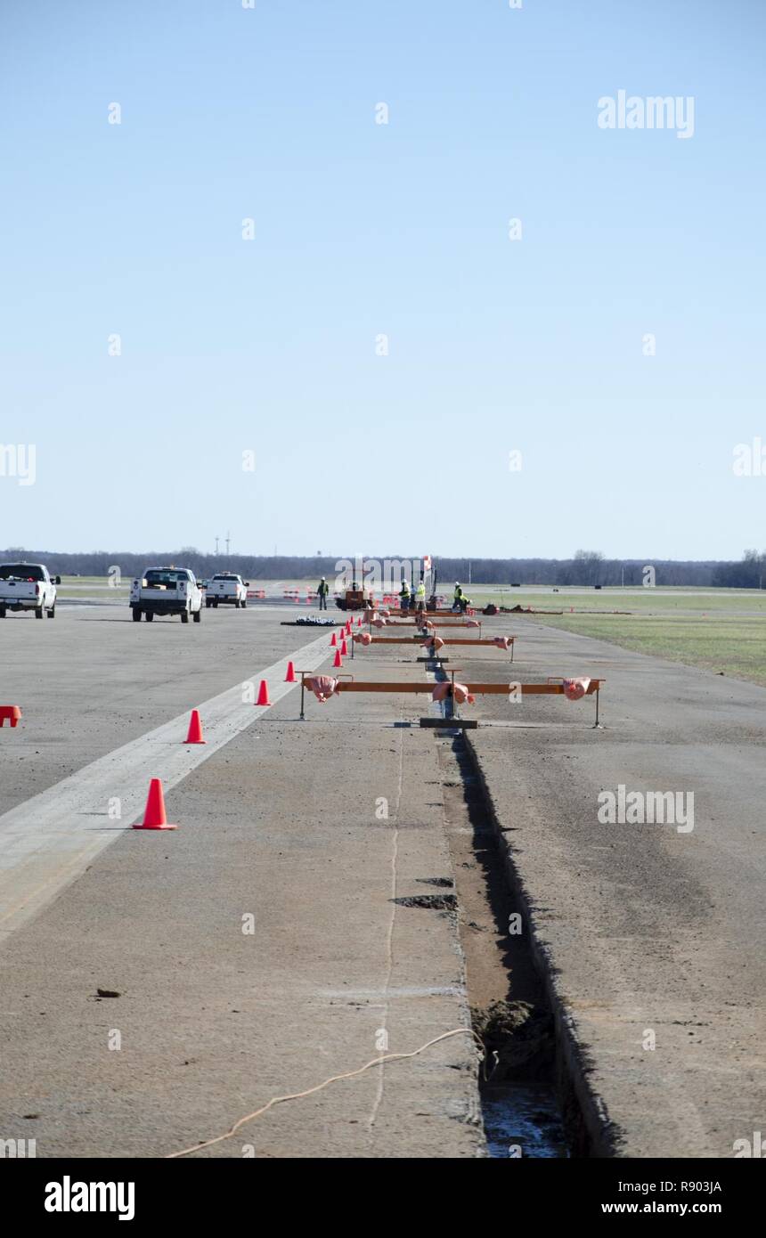 Contractors work on performing upgrades to lights at Campbell Army ...