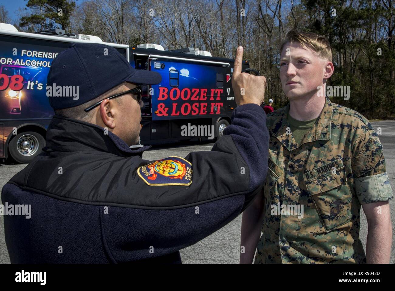 Jairo Palacio, left, police officer, Provost Marshal Office, Marine ...