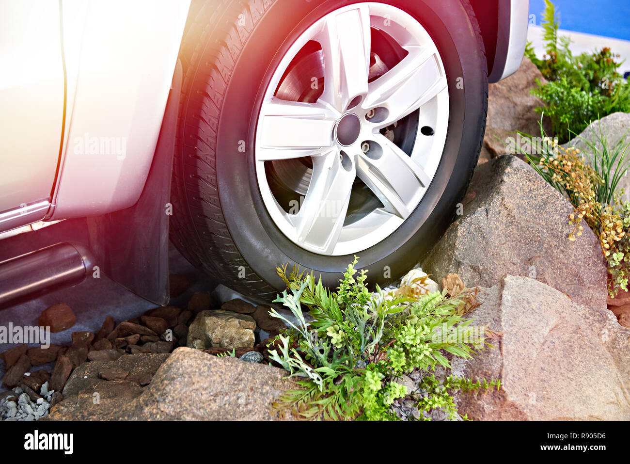 Car wheel and off-road driving Stock Photo - Alamy