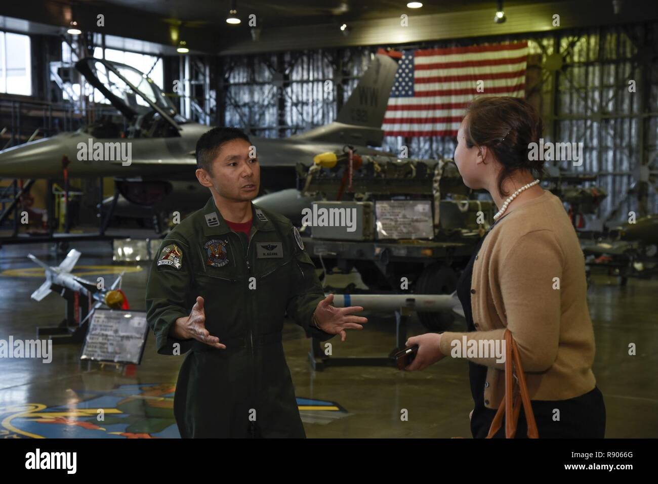 U.S. Embassy representatives speak with U.S. Air Force Col. R. Scott ...