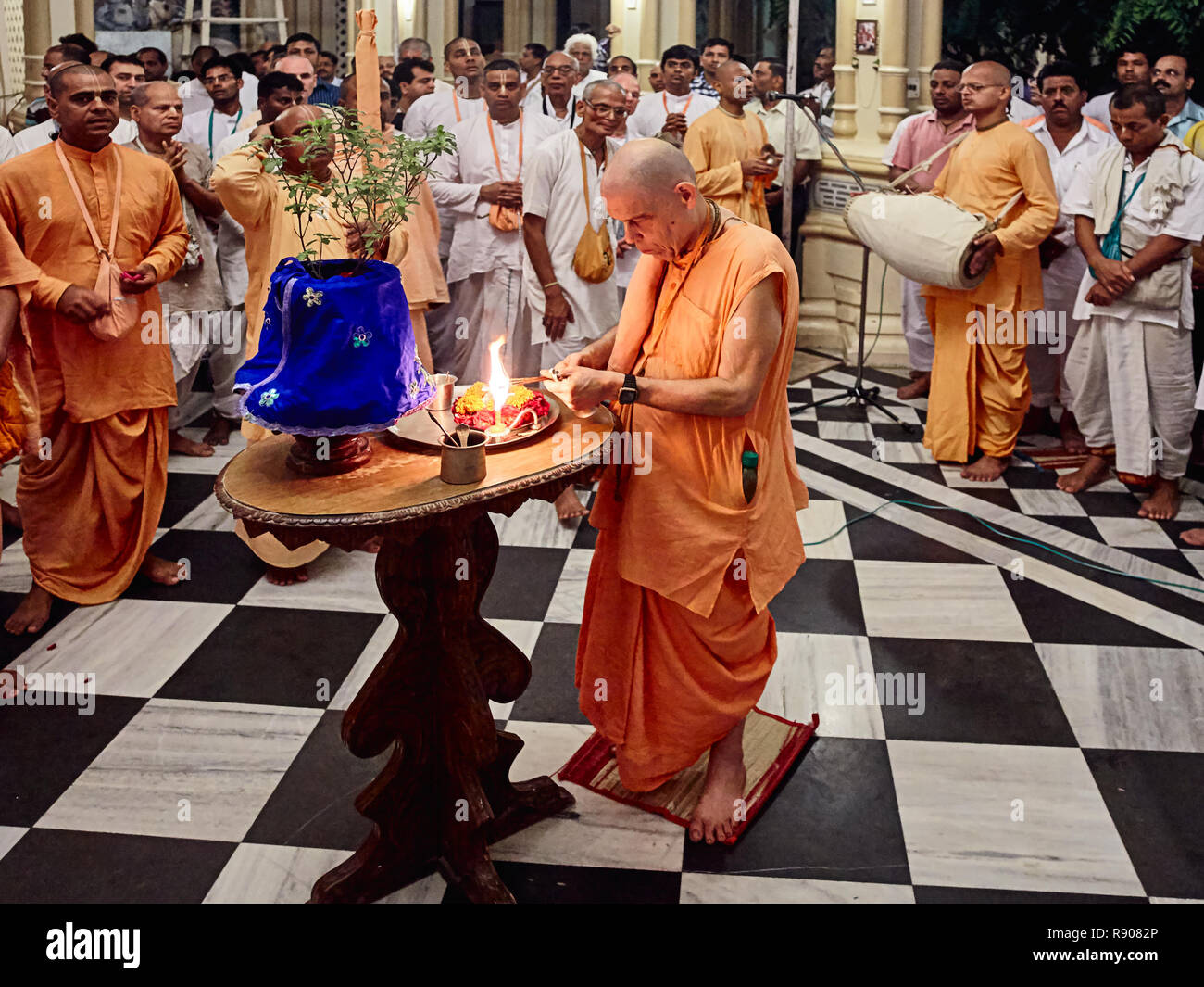 Hindu priest doing Tulasi Puja during the morning darshan inside the ...