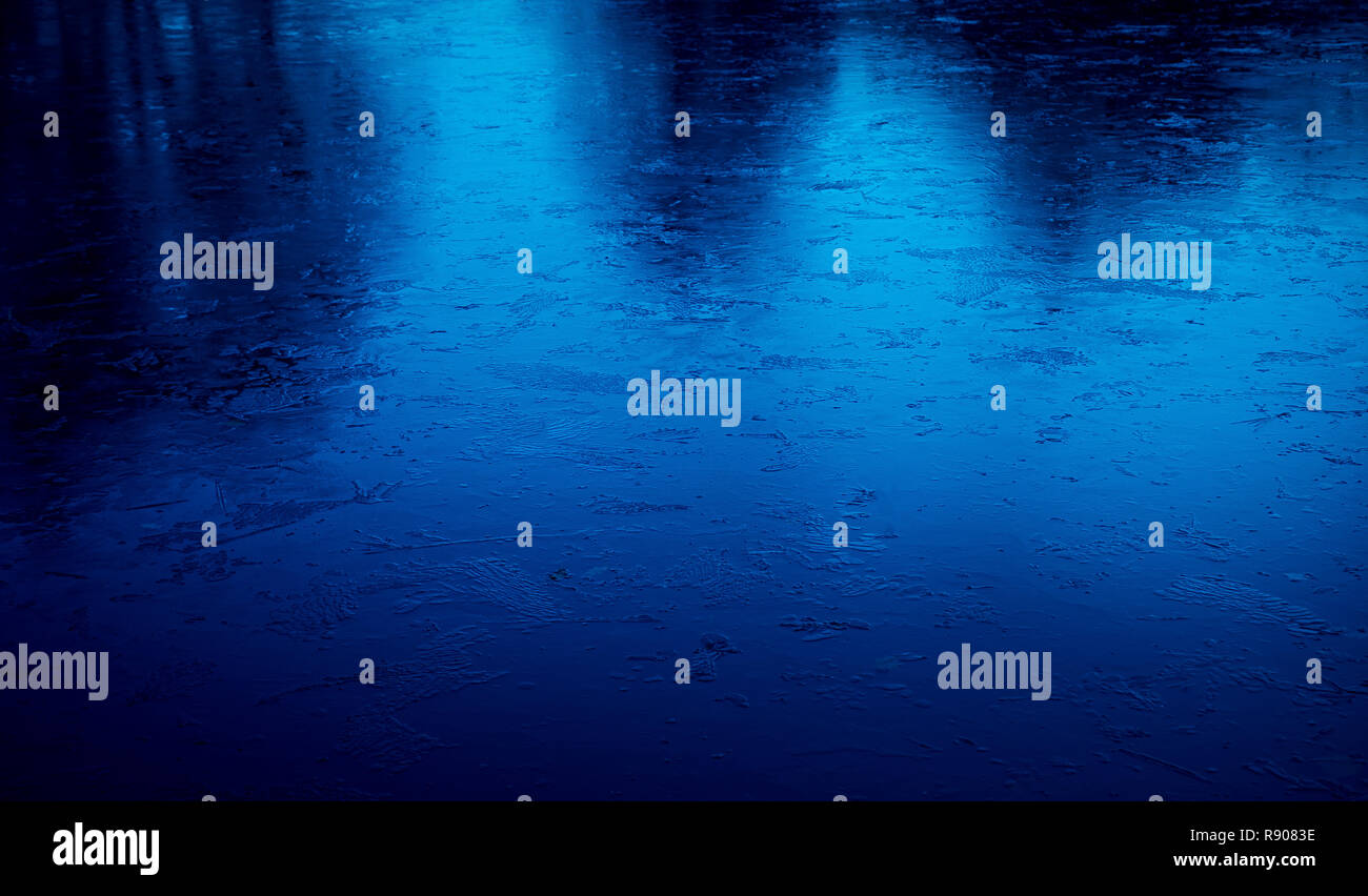 Frozen blue lake surface in winter Stock Photo - Alamy