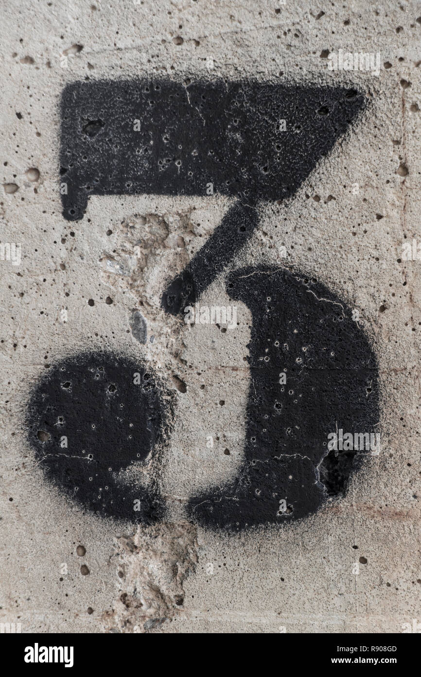 number three painted stencil on concrete wall, number three, number 3 ...