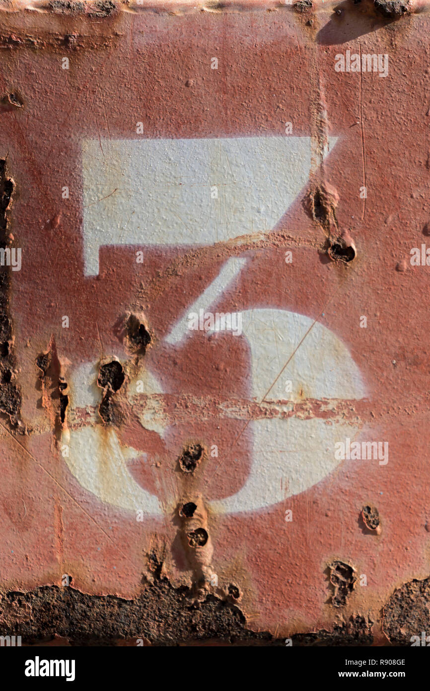 scratched rusty metal texture number three, number 3 Stock Photo - Alamy