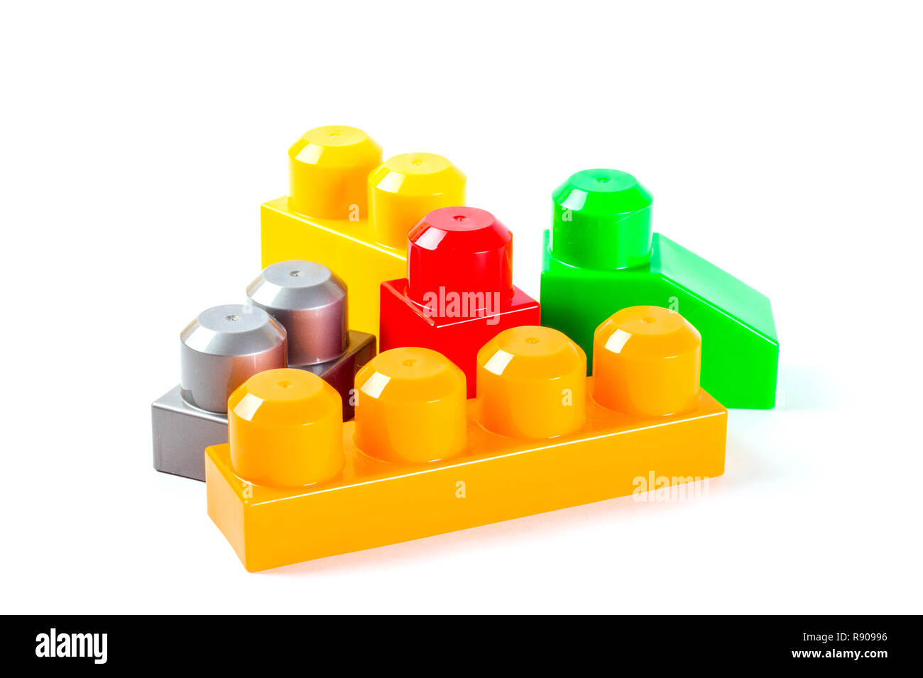 Coloured plastic building blocks isolated on white background Stock ...
