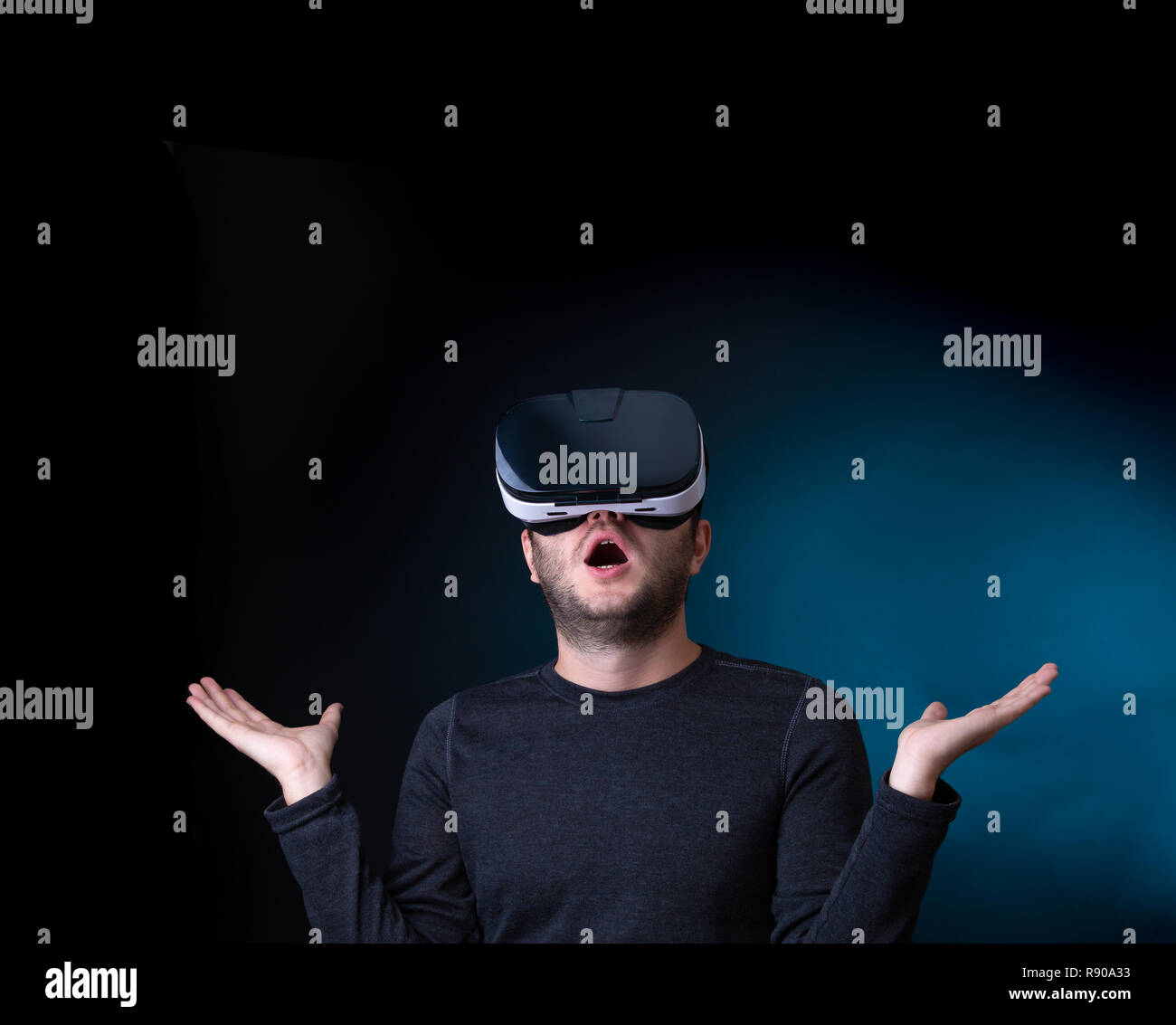 Surprised man in virtual hi-res stock photography and images - Alamy