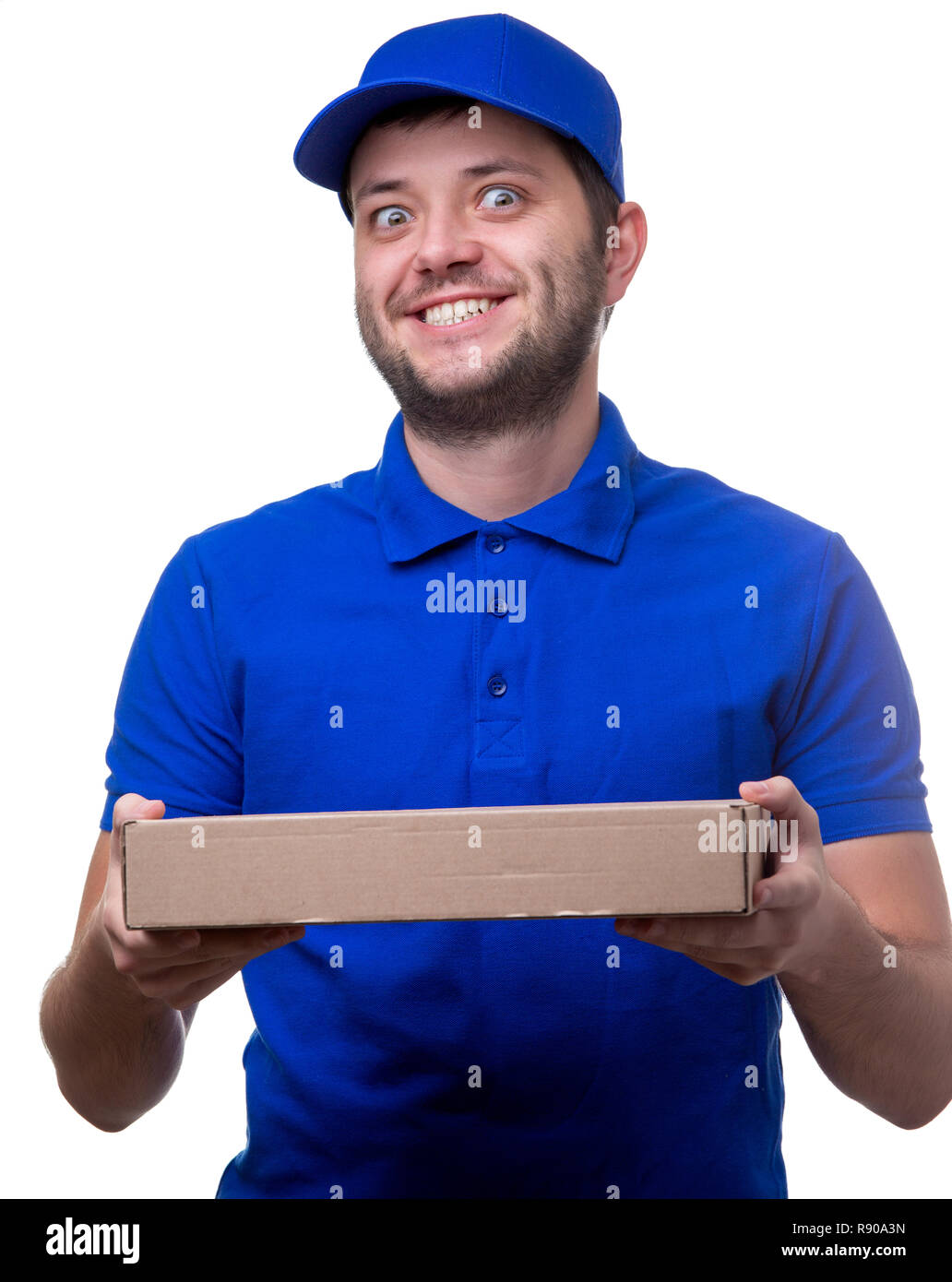 Image of happy man in blue T-shirt and baseball cap with cardboard box ...