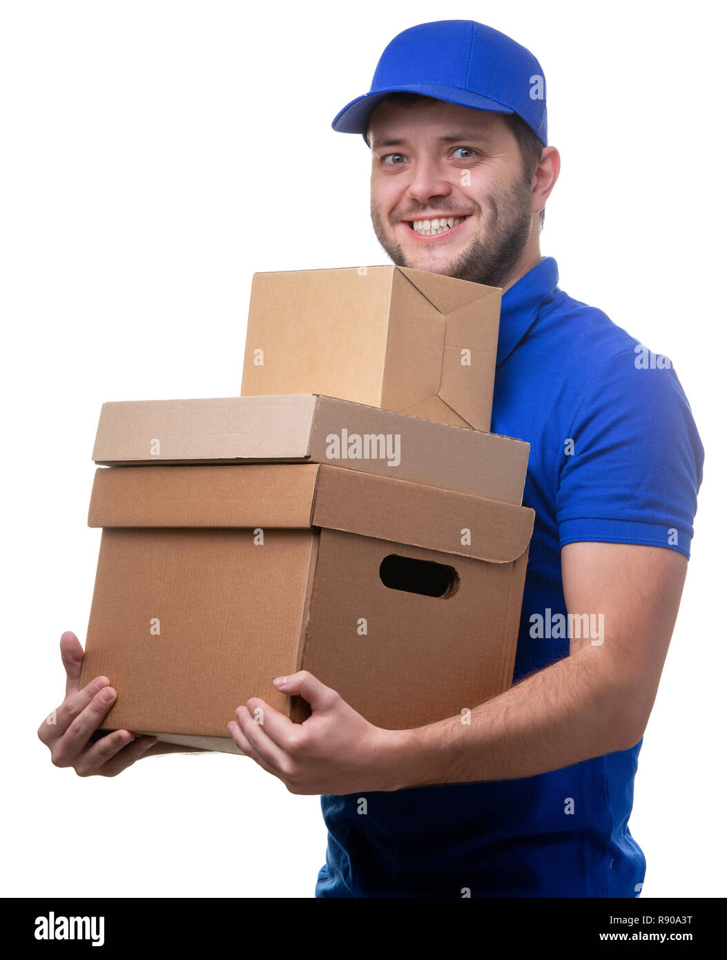 Photo of happy male courier with cardboard boxes Stock Photo - Alamy