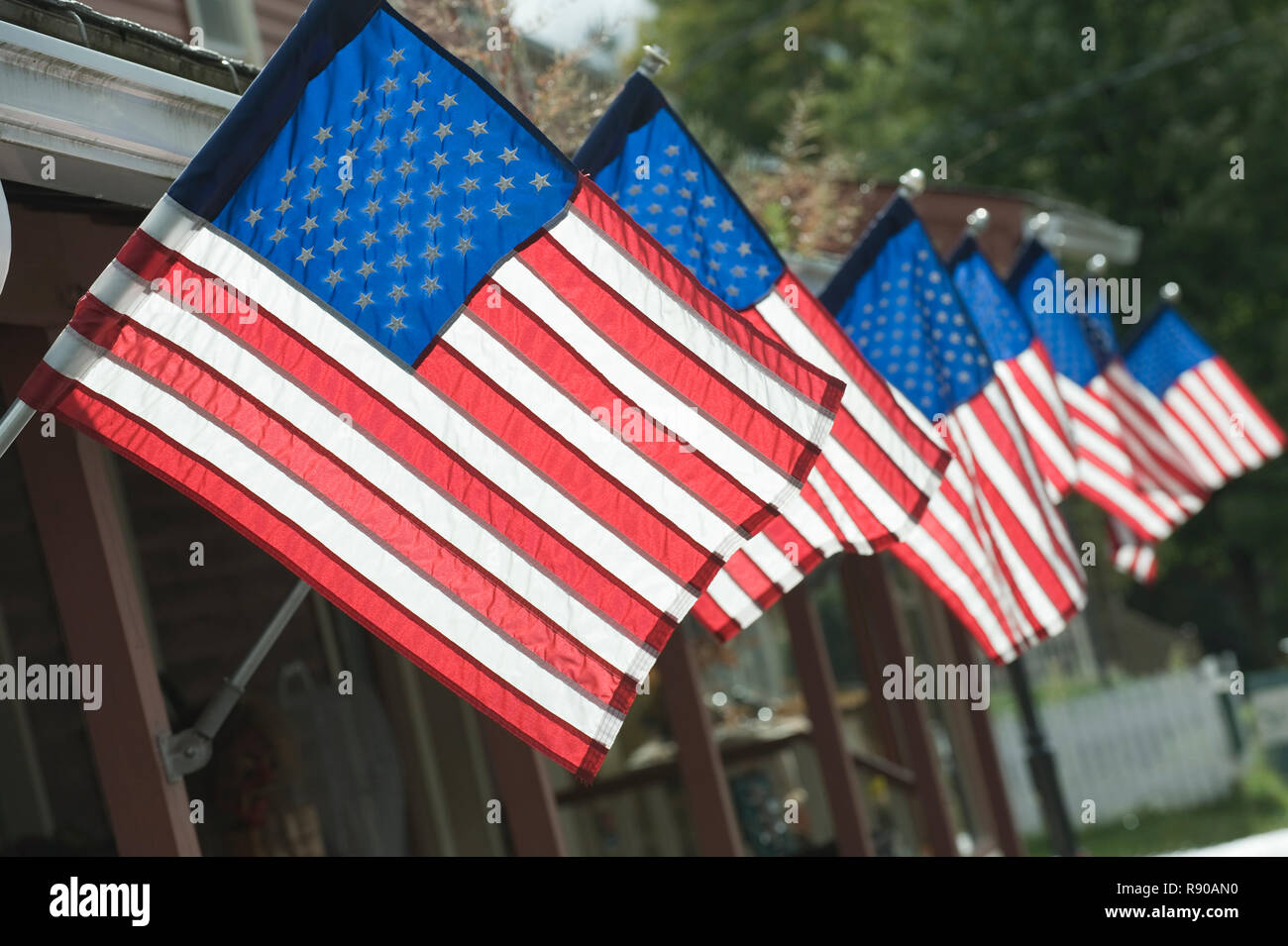 United States flags on storefronts Stock Photo - Alamy